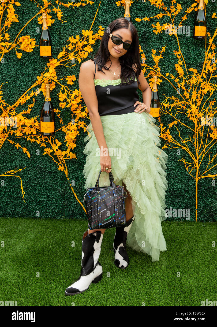 DJ Amrit attends 12th Annual Veuve Clicquot Polo Classic at Liberty ...