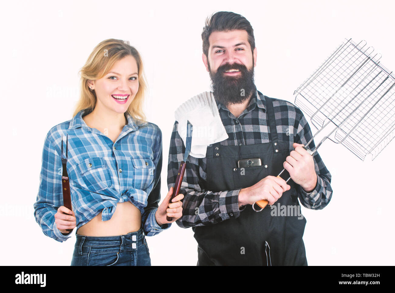 Do it yourself. Having barbecue party. Happy couple ready for cooking ...