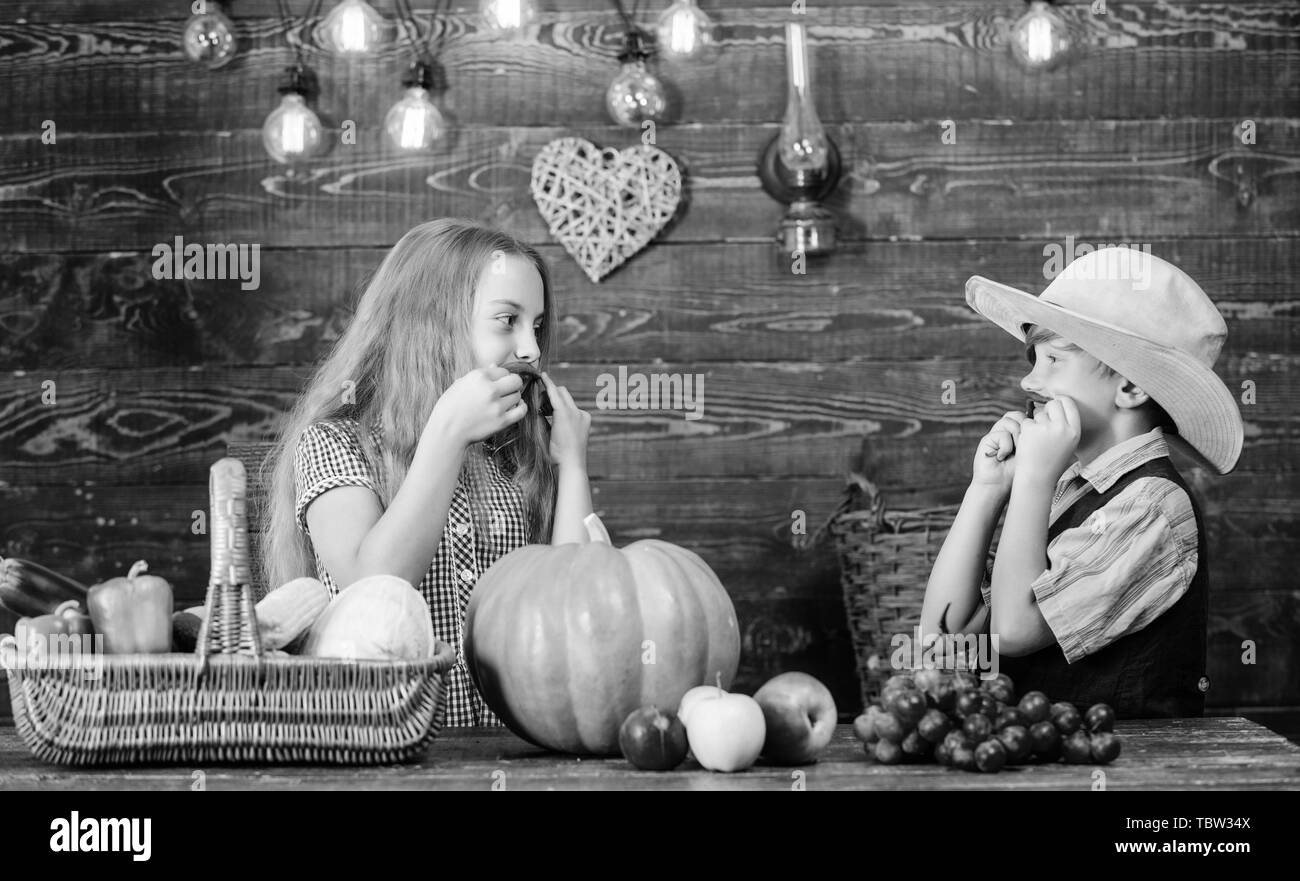 Kids farmers girl boy vegetables harvest. Family farm. Children ...