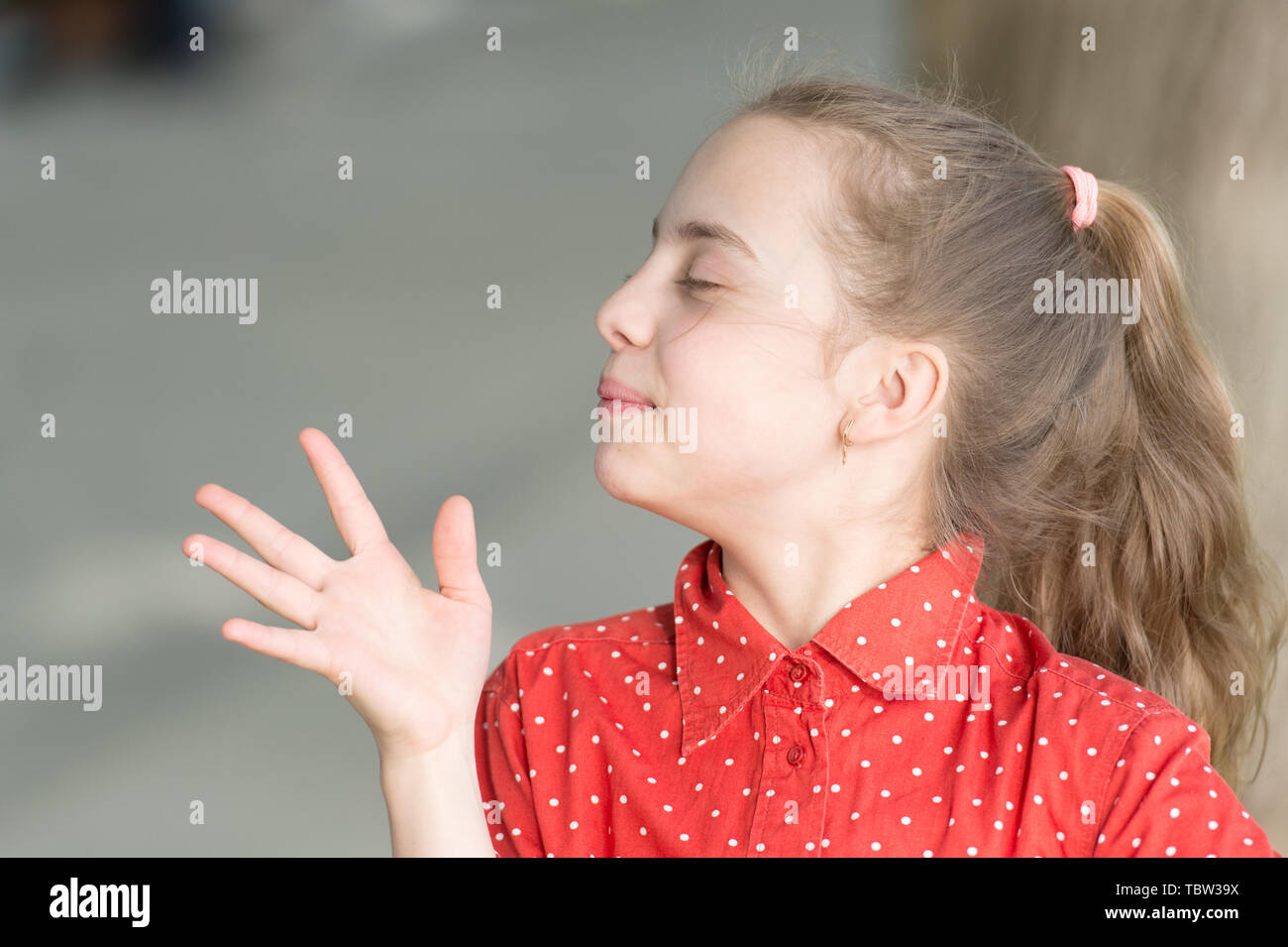 Nurturing her skin naturally. Small child with healthy skin and beauty ...