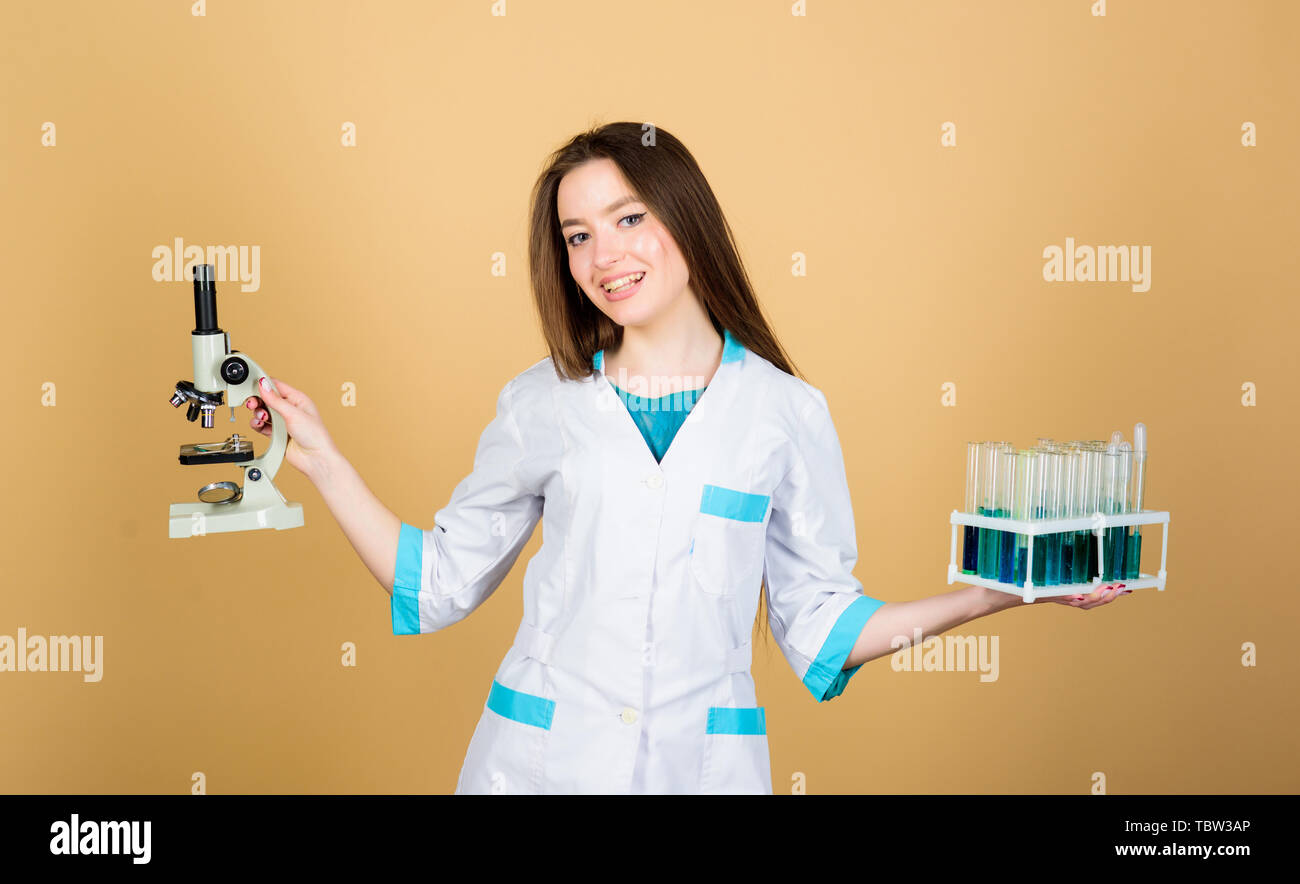 Medical analysis. Nurse doctor scientist with test tubes. Experimental ...