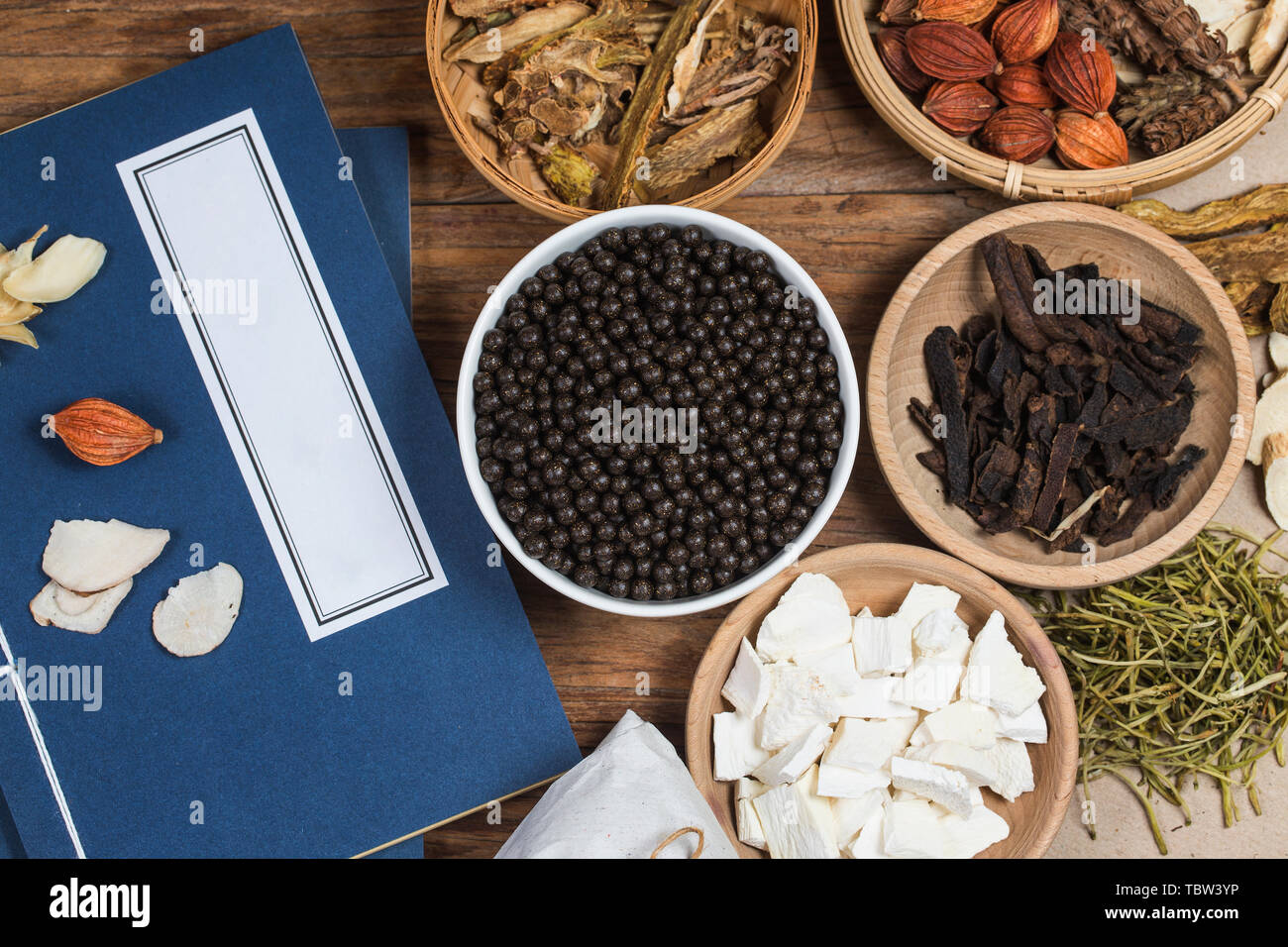 Stacked Chinese herbal medicine pills Stock Photo - Alamy