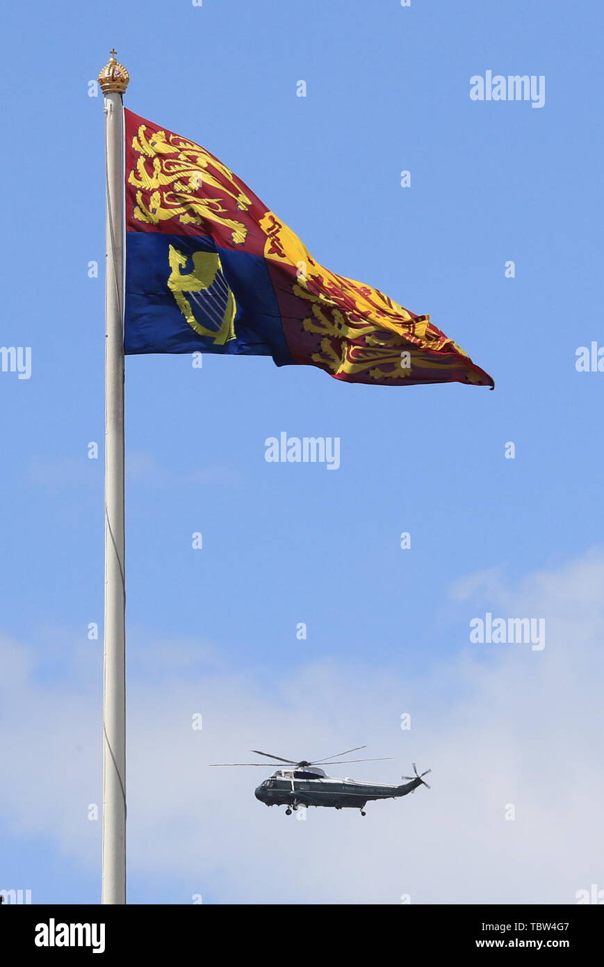 US presidential helicopters pass the Royal Standard flying from the ...