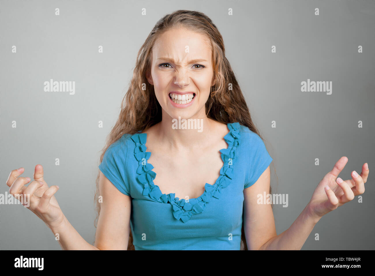 young serious angry woman portrait Stock Photo - Alamy