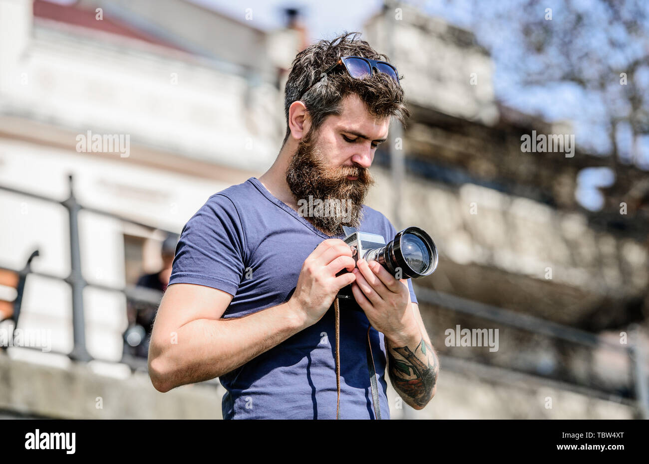 nice shot. retro photographic equipment. hipster man in summer ...