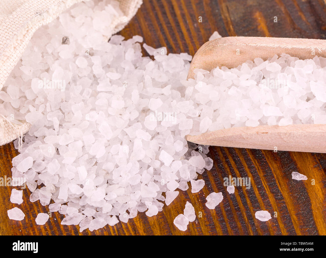 sea salt in jute sack on wooden table Stock Photo - Alamy