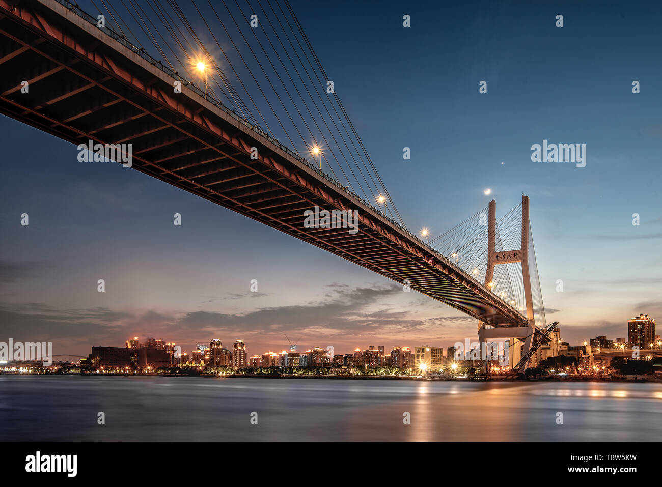 Sunset of Nanpu Bridge in Shanghai Stock Photo - Alamy