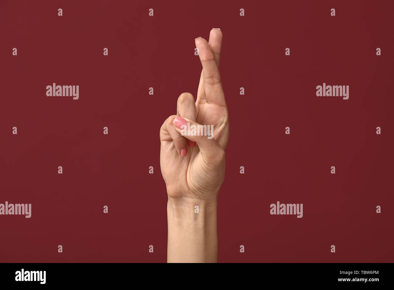 Female hand showing letter R on color background Stock Photo - Alamy
