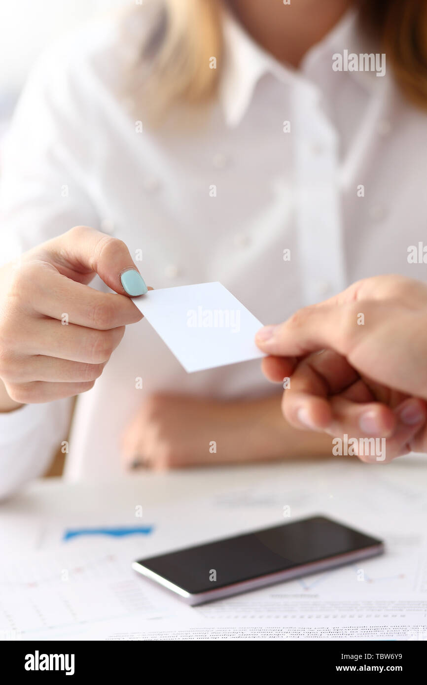 Female hand in suit give blank calling card Stock Photo - Alamy