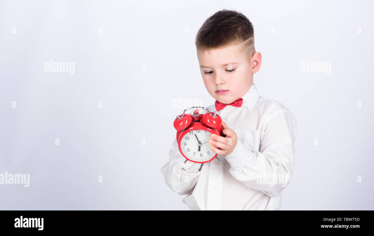 Party time. Businessman. Formal wear. little boy with alarm clock. Time ...