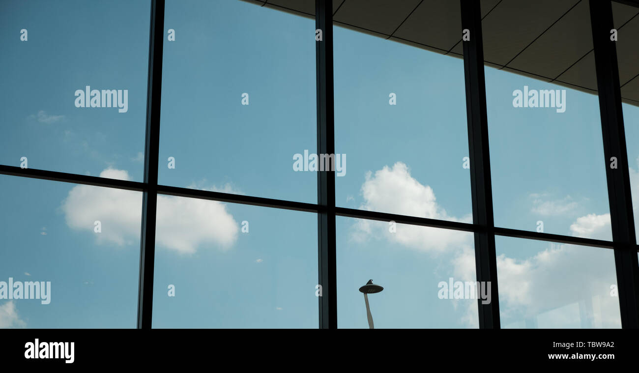 view through modern window architecture of sky in a sunny day with ...