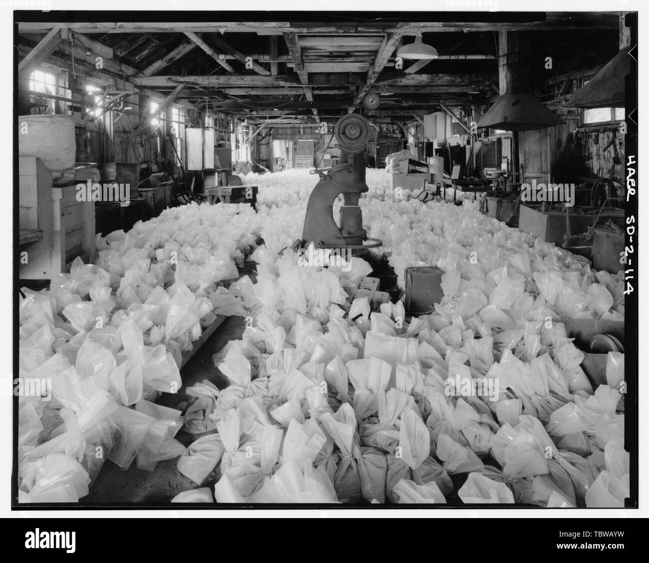 MACHINE SHOP INTERIOR FROM WEST. POWER HAMMER IN CENTER OF VIEW, FORGES ...