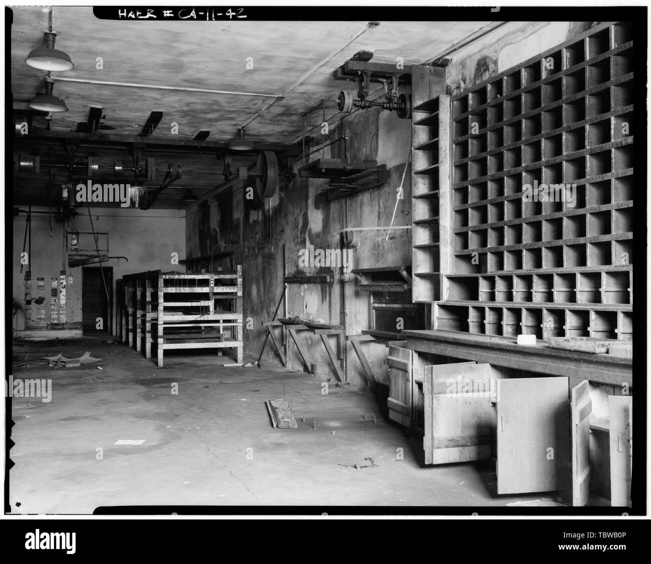 MACHINE SHOP Machine shop area with small parts bins on the right and ...