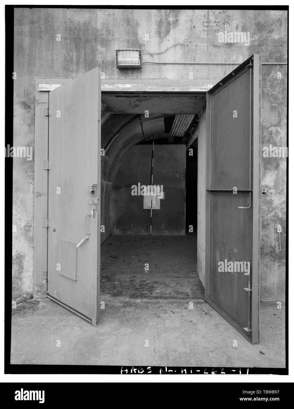 MAGAZINE E3. ENTRY WITH DOORS OPEN SHOWING FIRST BLAST WALL WITH RANGE ...