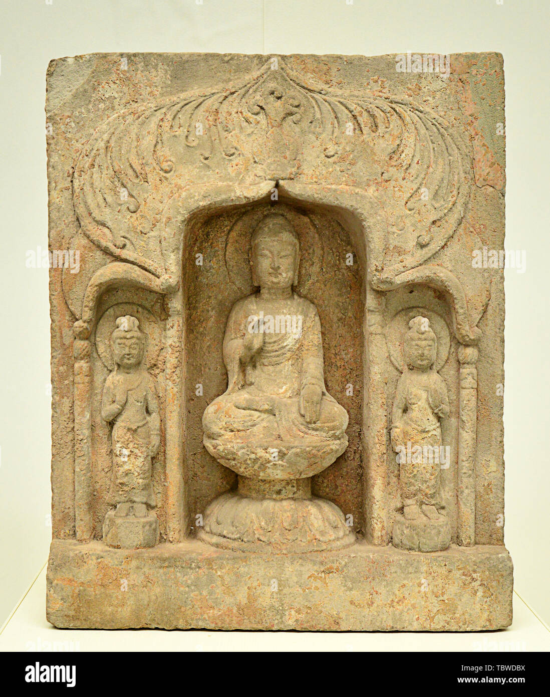 Buddhist stone statue Stock Photo - Alamy