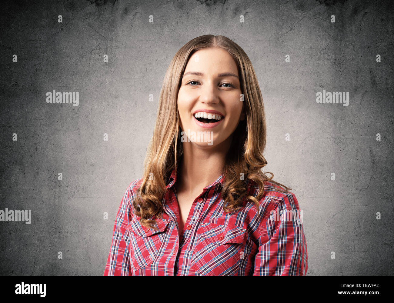 Happy charming girl smiling wide Stock Photo - Alamy