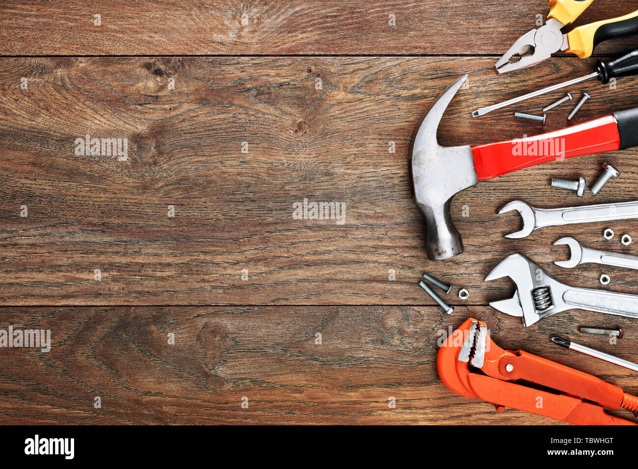 Assorted work tools on wooden background with copy space Stock Photo ...