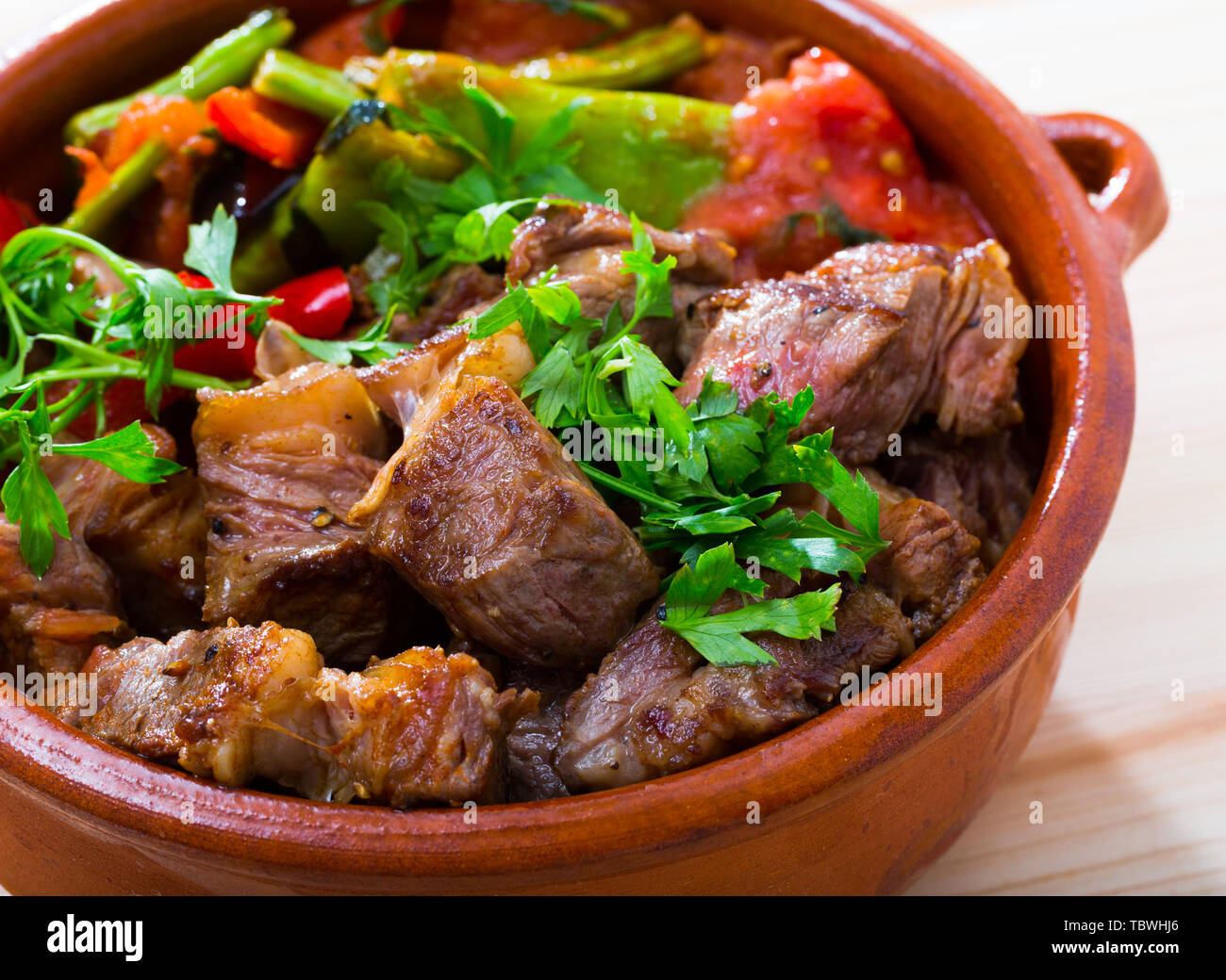 Portrait of cooked gyuvech dish of bulgarian cuisine of beef with ...