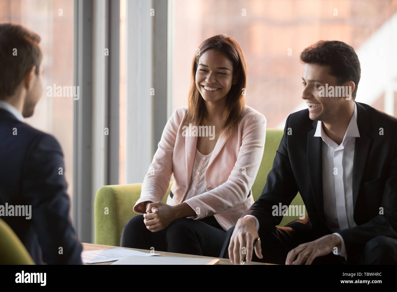 Positive working atmosphere hi-res stock photography and images - Alamy