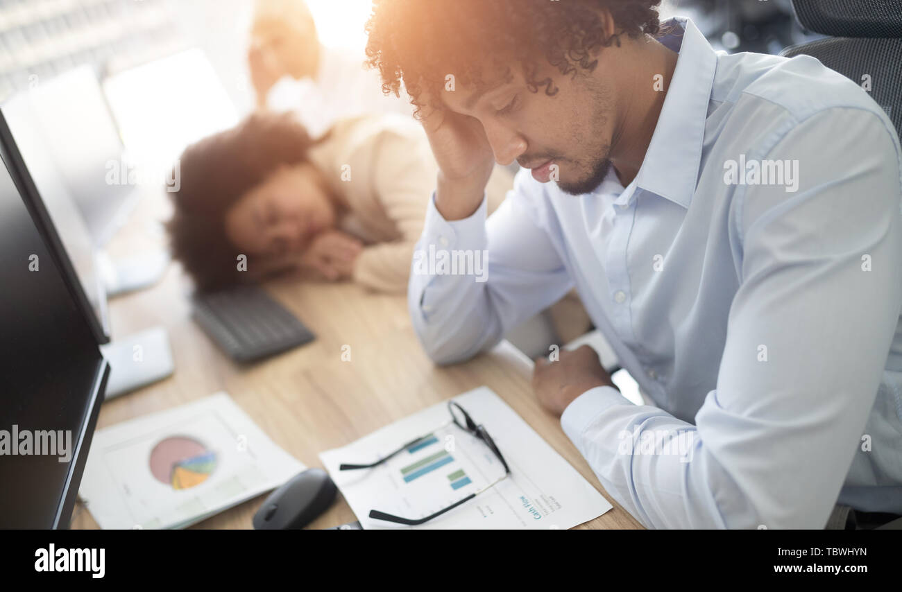 Overworking concept. Group of business people exhausted in office Stock ...