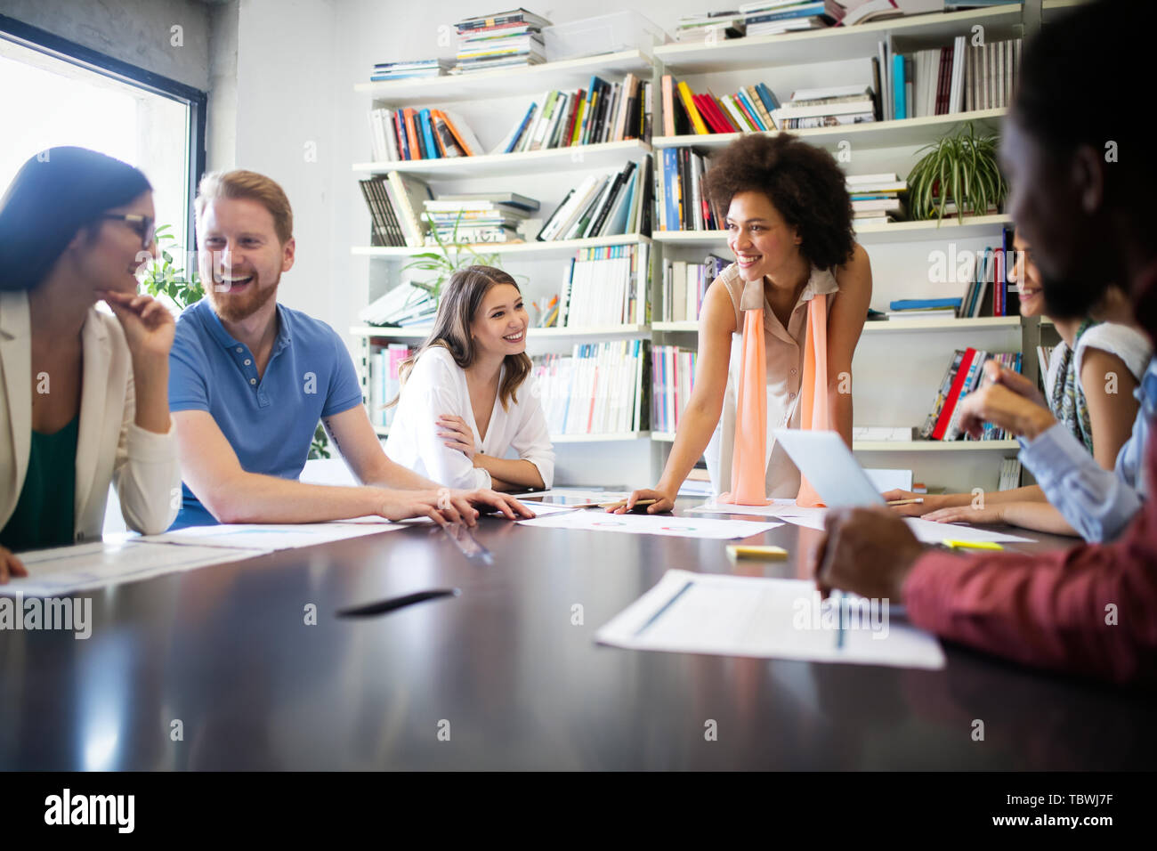 Creative business people working on business project in office Stock ...