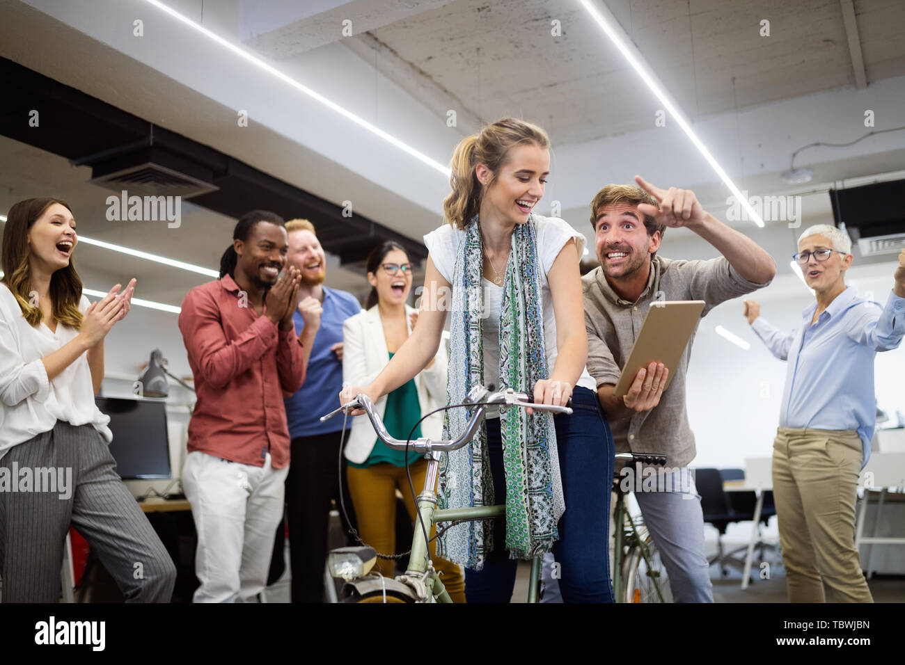 Carefree diverse office workers having fun during work break Stock ...