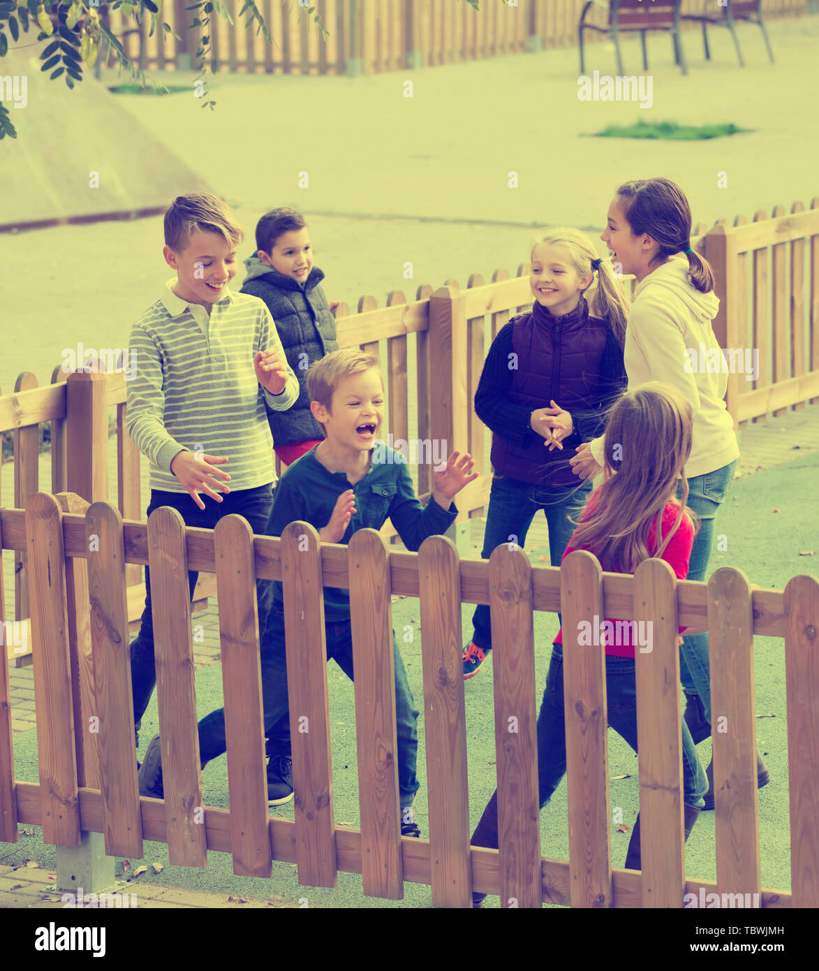 Happy children playing Touch-last active game outdoor Stock Photo - Alamy