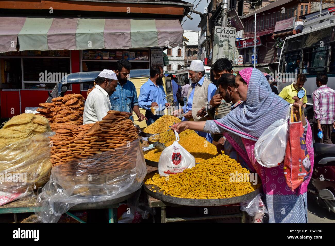 A Kashmiri woman shops ahead of Muslim festival Eid al-Fitr at a local ...