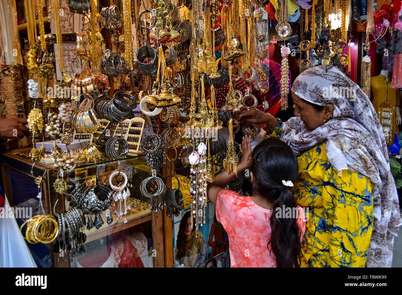 A Kashmiri woman shops ahead of Muslim festival Eid al-Fitr at a local ...