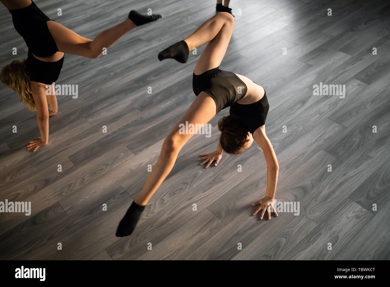 Group of young fit dancers practicing during class school Stock Photo ...