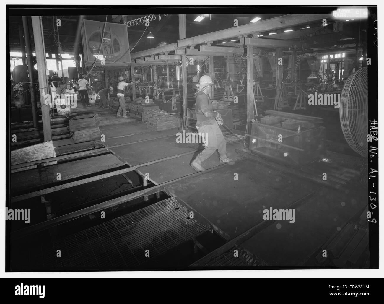 MOVING A NOW JACKETLESS MOLD OFF OF THE POURING PLATFORM ONTO THE ...