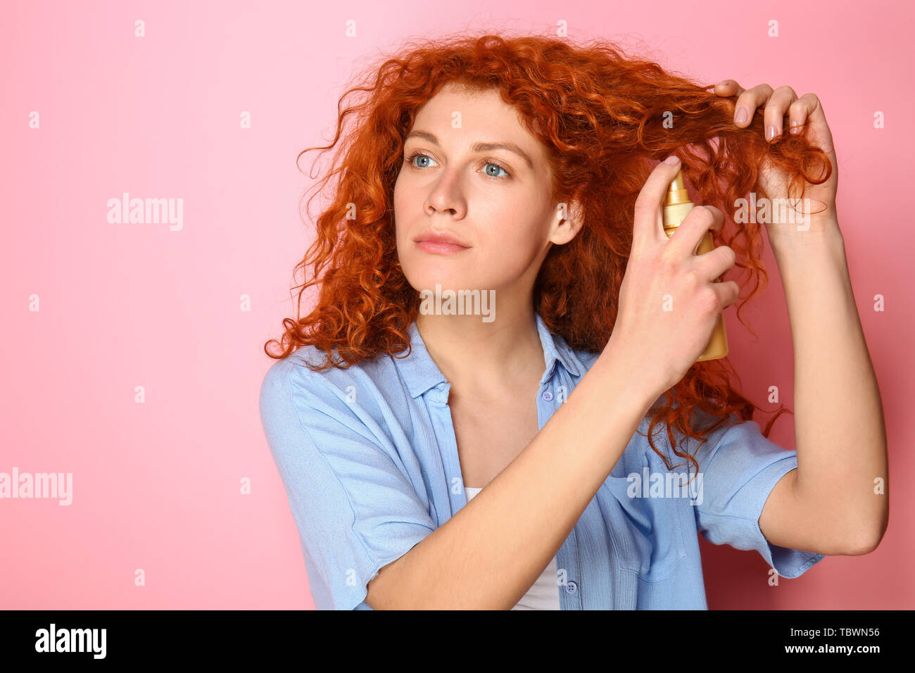 Using hair spray hi-res stock photography and images - Alamy