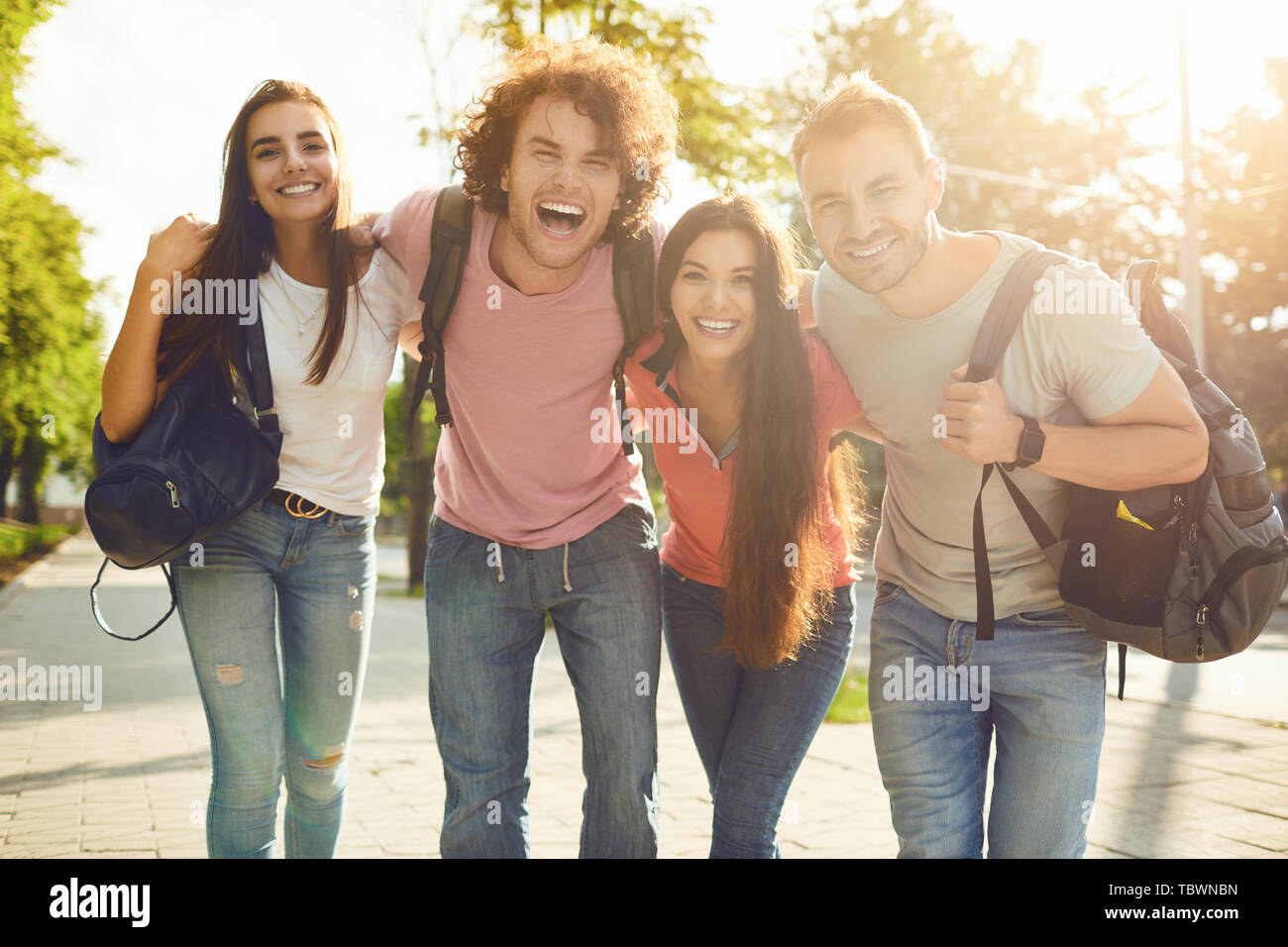Group friends adult hug autumn hi-res stock photography and images - Alamy