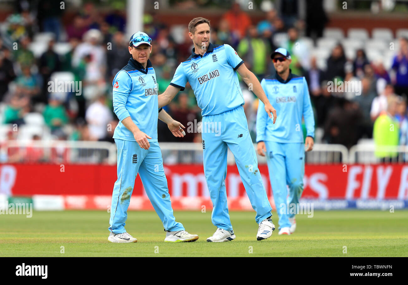 England's Eion Morgan (left) celebrates catching out Pakistan's Shoaib ...