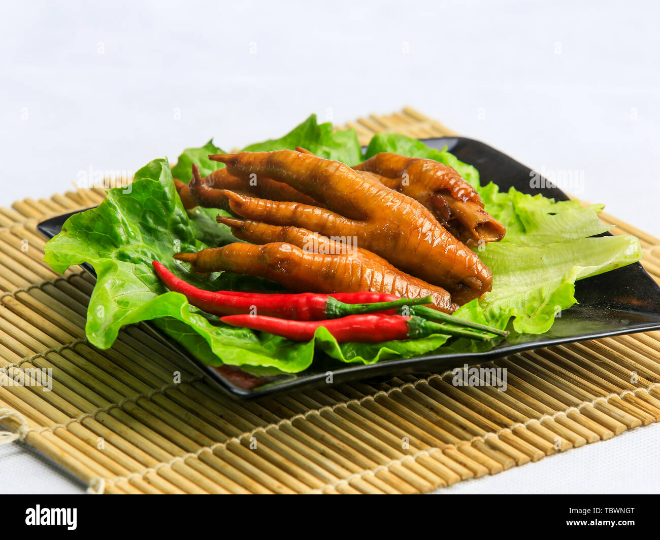 Tasty chicken feet hi-res stock photography and images - Alamy