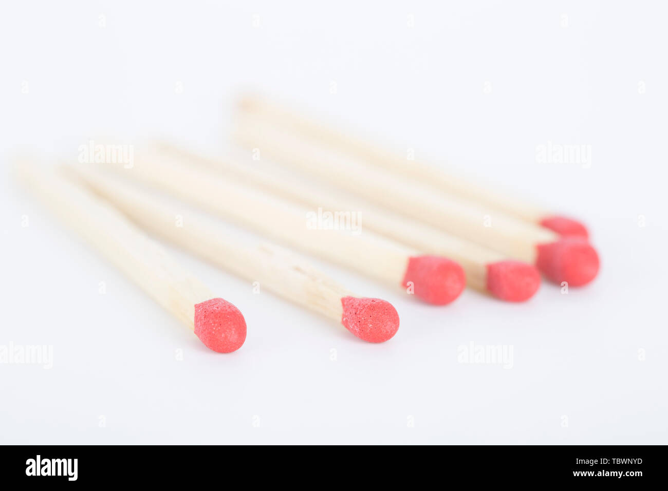 Matches on white background Stock Photo - Alamy