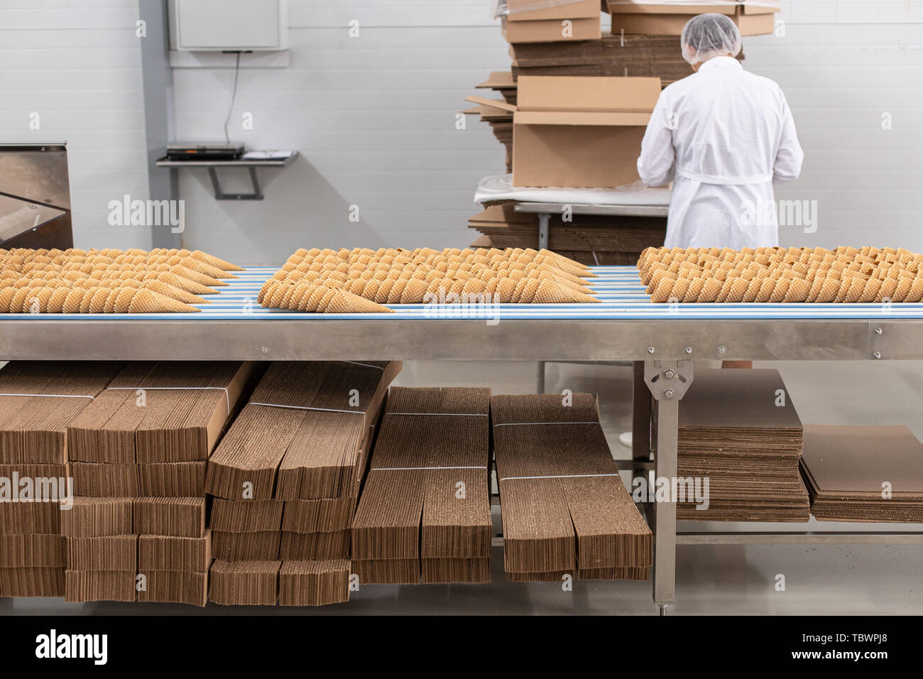 Ice cream production line. Conveyor production. Production of wafer ...