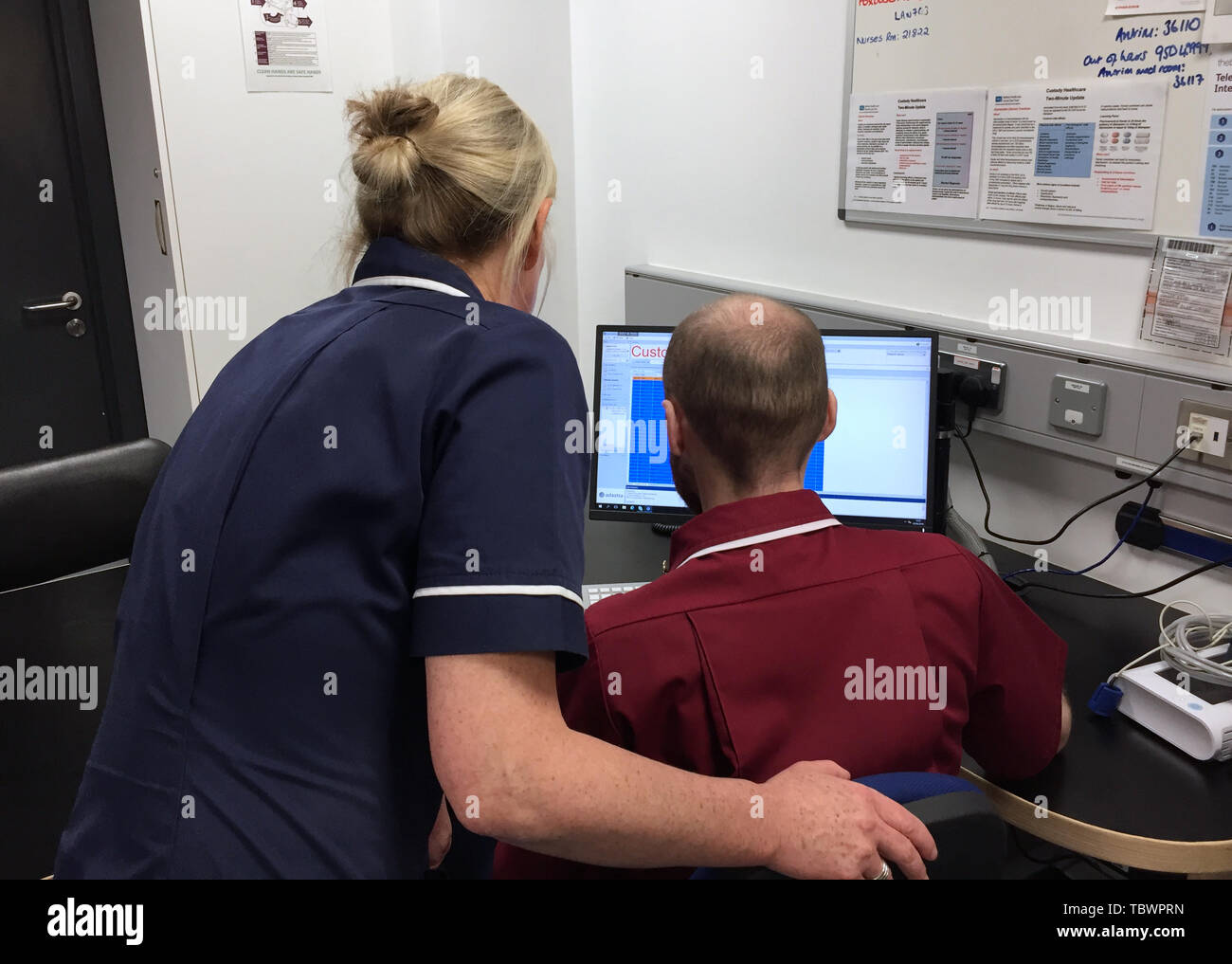 Nurses at work inside a custody suit at Musgrave Street PSNI station in ...