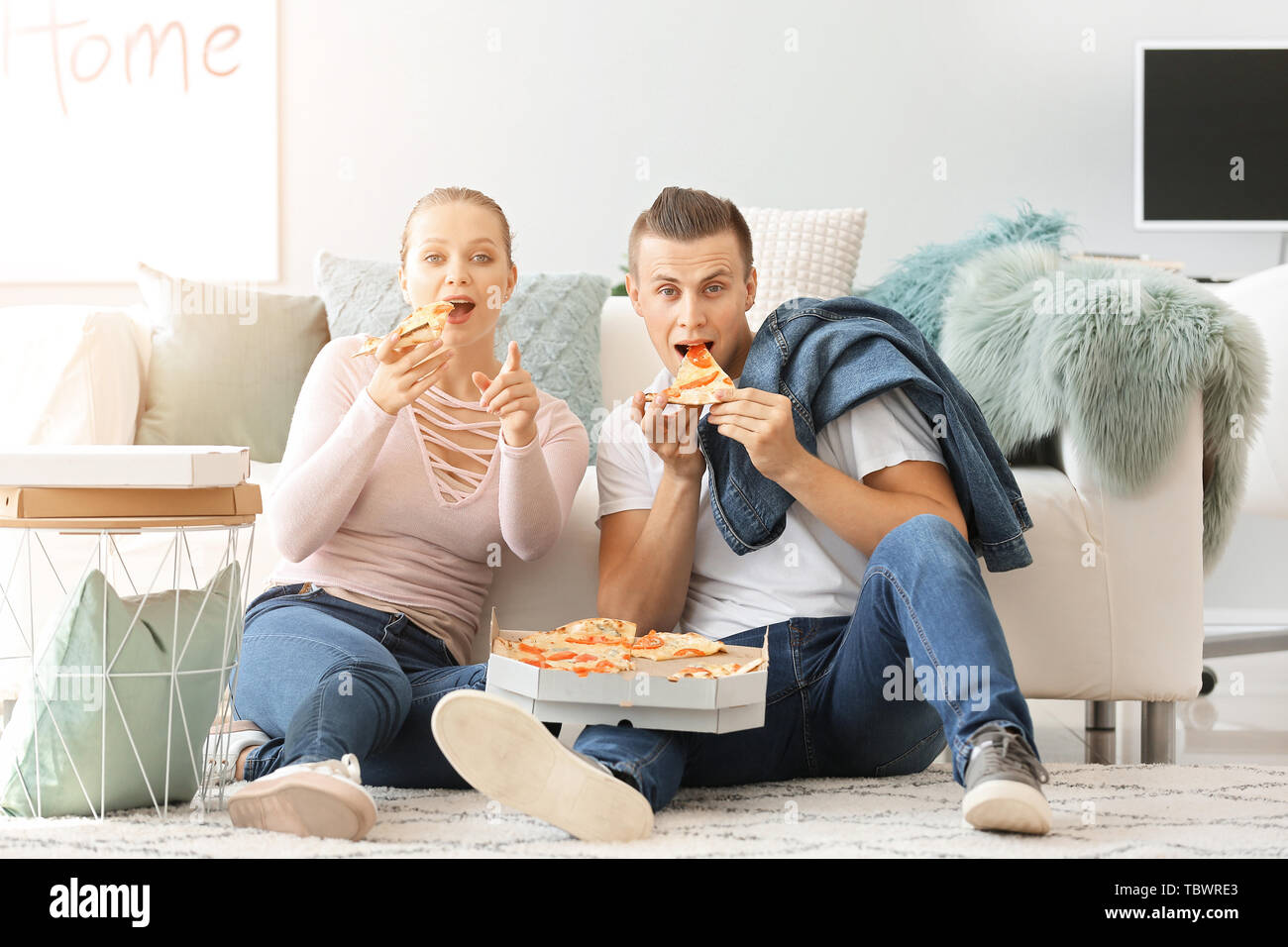 Couple eating tv dinner hi-res stock photography and images - Alamy