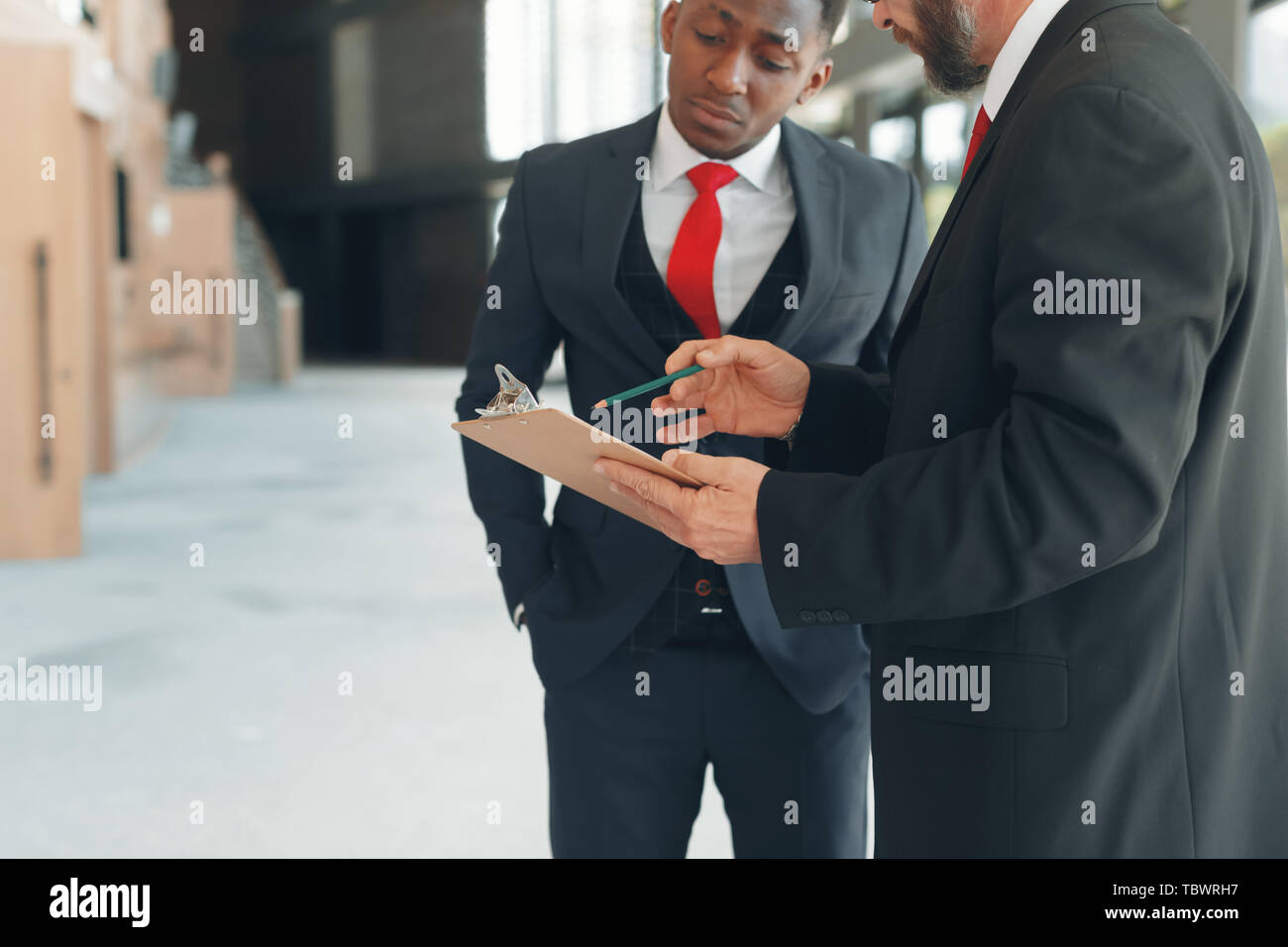Business partners in a modern office Stock Photo - Alamy