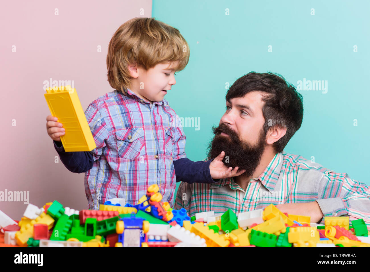 Playing with daddy. building home with constructor. child development ...