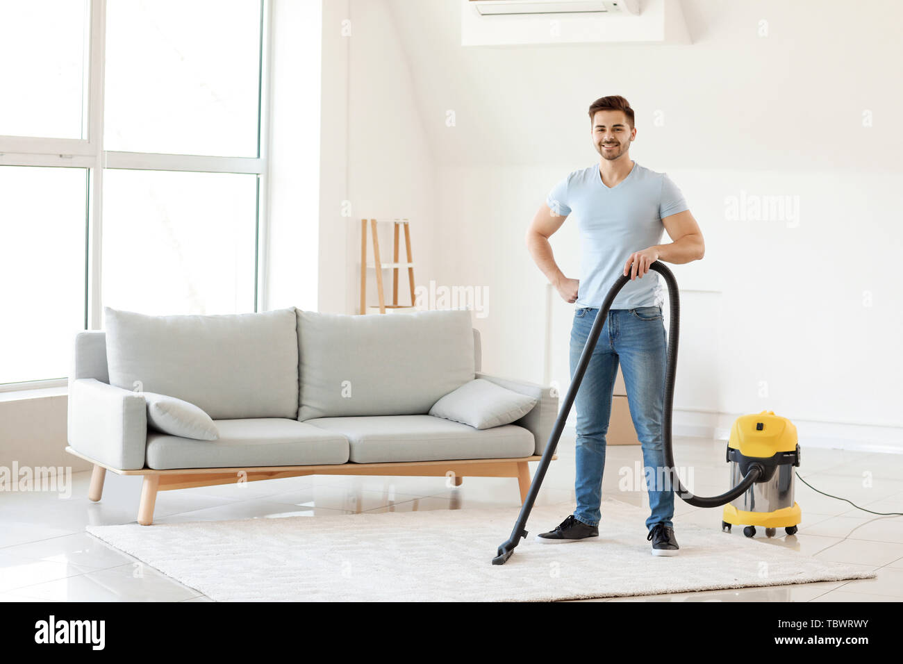 Man hoovering hi-res stock photography and images - Alamy