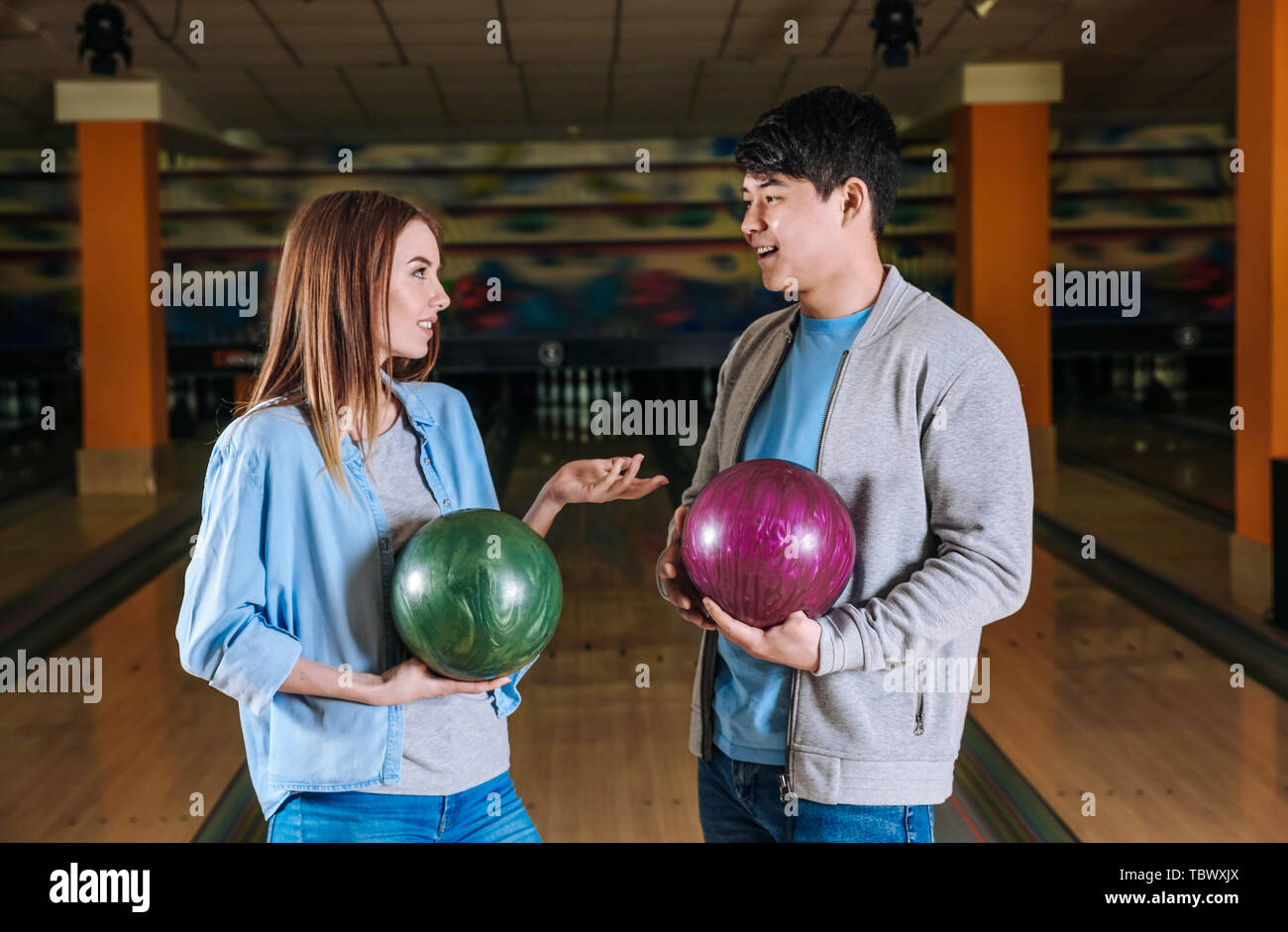 Portrait of friends in bowling club Stock Photo - Alamy