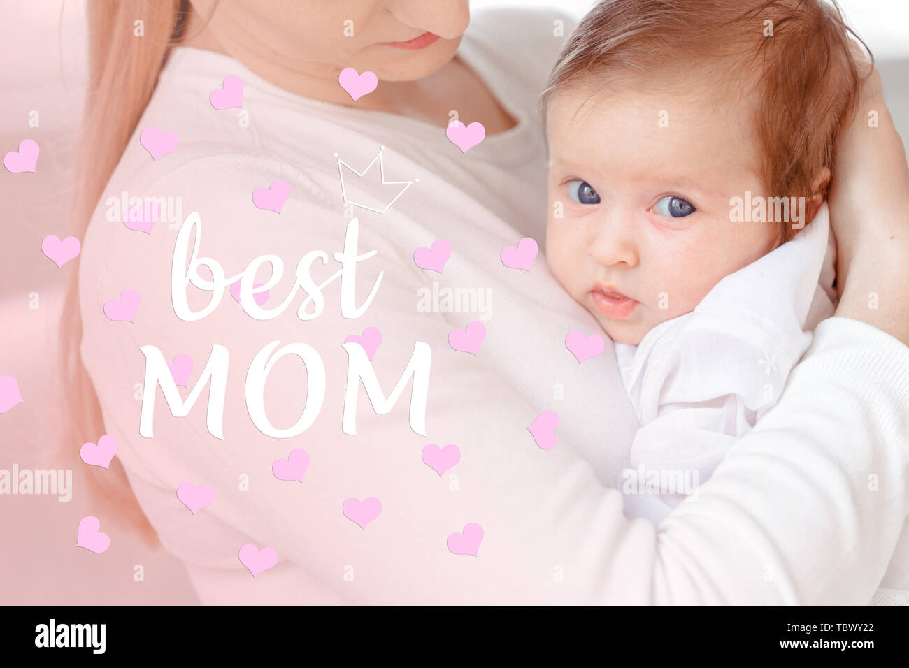 Woman rocking chair holding baby hi-res stock photography and images ...