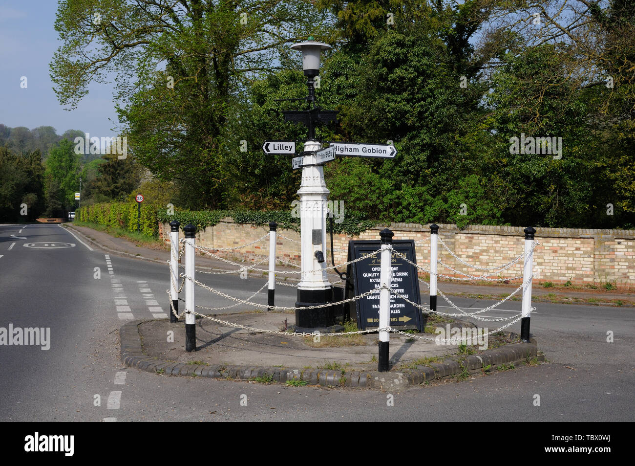 Pump, Signpost, and Lamp, at the crossroads, Hexton, Hertfordshire. The ...