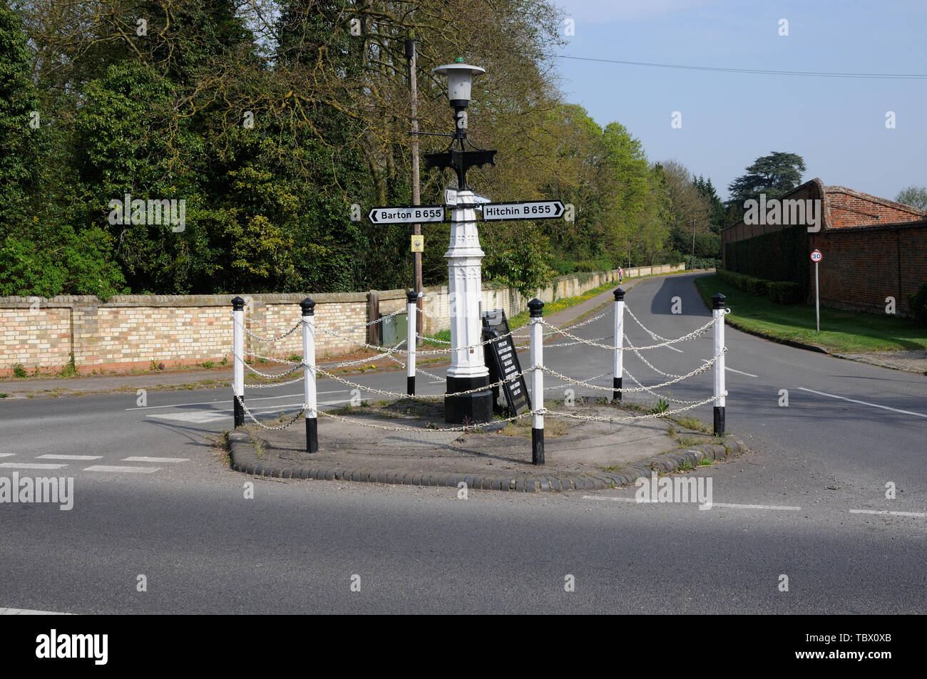 Pump, Signpost, and Lamp, at the crossroads, Hexton, Hertfordshire. The ...