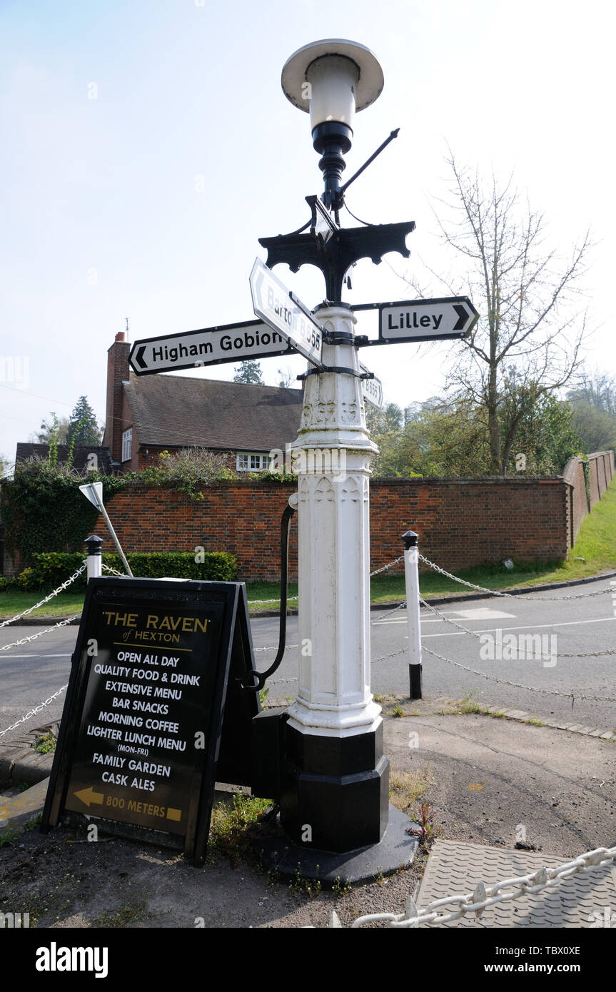 Pump, Signpost, and Lamp, at the crossroads, Hexton, Hertfordshire. The ...