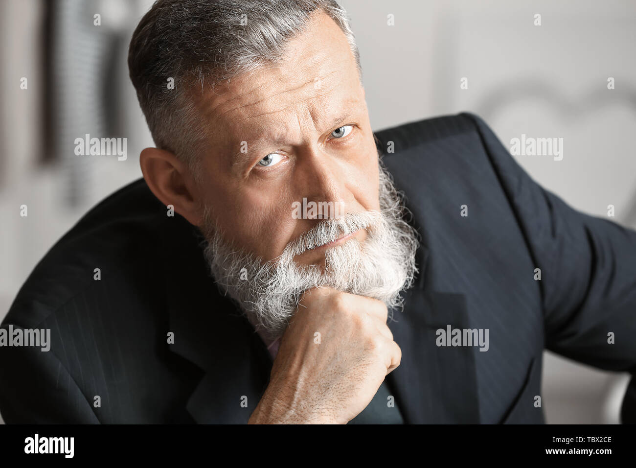 Portrait of sad senior man at home Stock Photo - Alamy