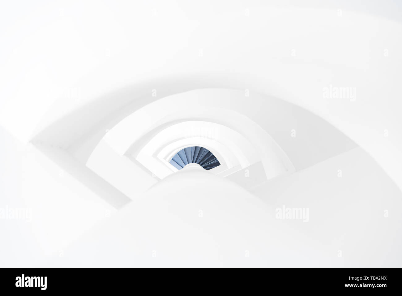 Rotating staircase minimalist white Stock Photo - Alamy