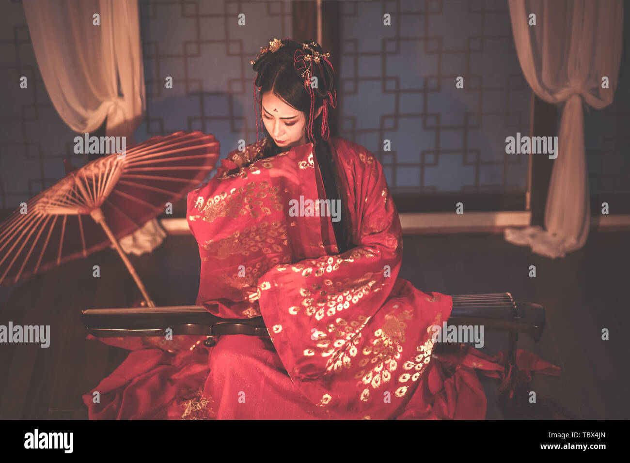 Photography of ancient Chinese clothes Stock Photo - Alamy